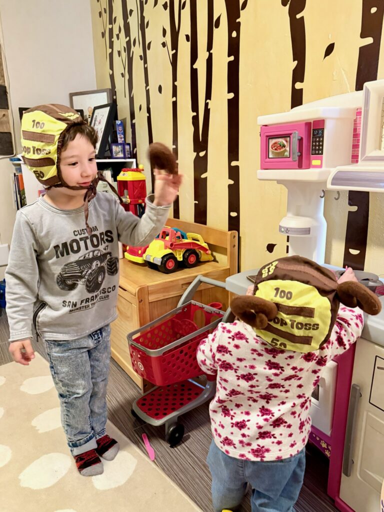 Playing Poop Toss with brother Jasper - COTA for Juniper Strong